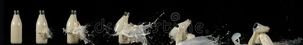 Bottle of Milk Exploding Against Black Background Stock Photo - Image ...