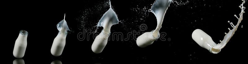 Bottle of Milk Falling and Exploging Against Black Background Stock ...