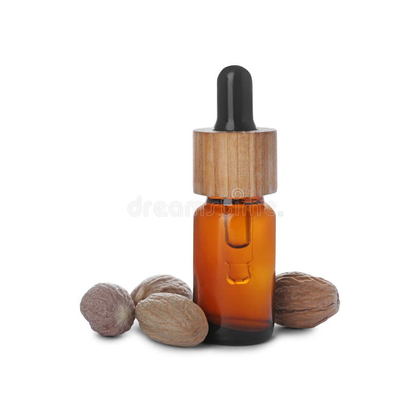 Bottle of Nutmeg Oil and Nuts on White Background Stock Image - Image ...