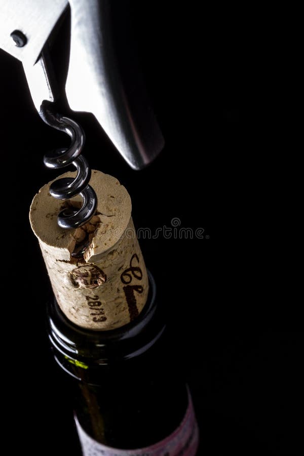 Bottle opening with cork stock photo. Image of silhouette - 169610618