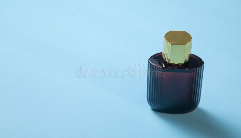 Bottle of Perfume on the Blue Background Stock Image - Image of blue ...