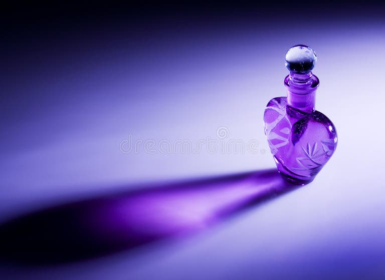 Bottle of Perfume Dramatically Lit. Stock Image - Image of container ...