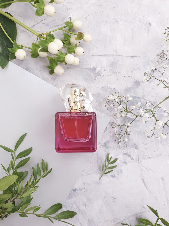 Bottle Perfume Flower Fragrance Atomizer on a Concrete Background Stock ...