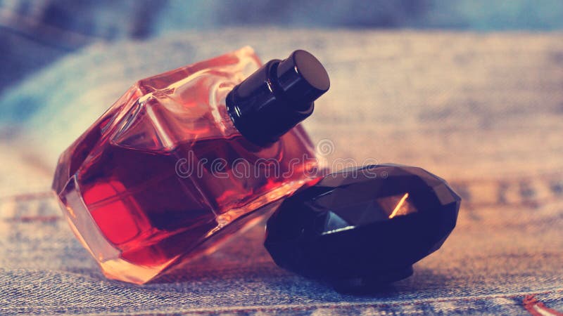 Bottle of Perfume on the Jeans, Brown Color, Brown Toned Stock Photo ...