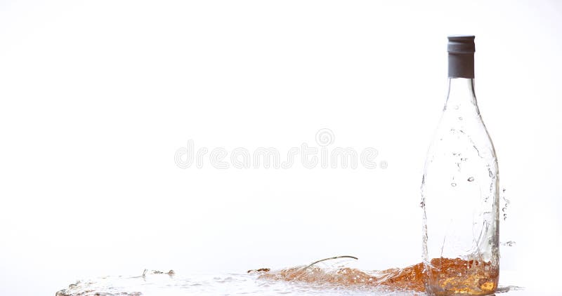 Bottle of Pink Wine Breaking and Splashing Against White Background ...