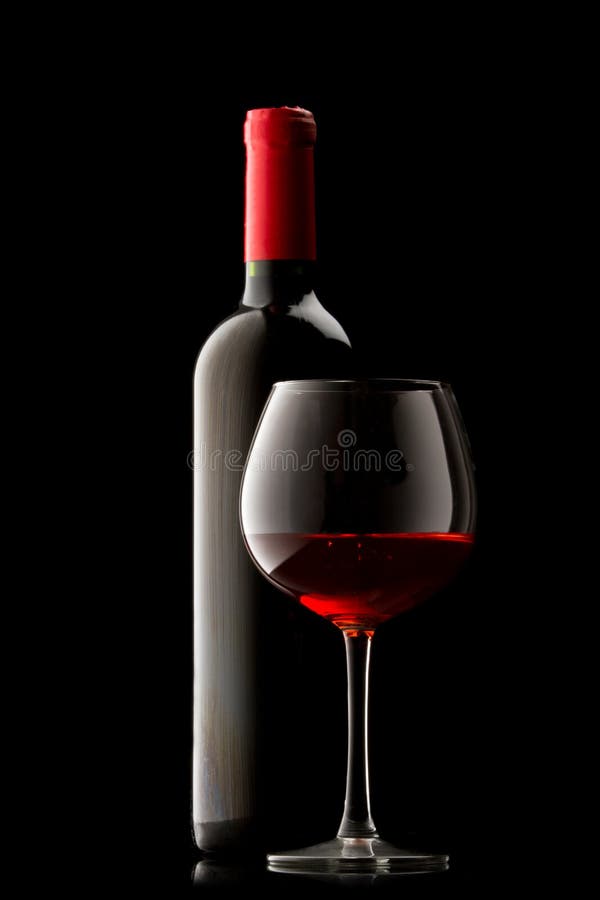 Bottle with Red Wine and Glass on a Black Stock Image - Image of black ...