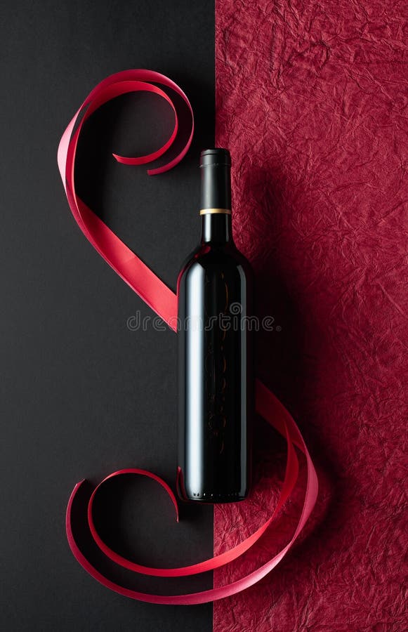 Bottle of Red Wine with Red and Pink Satin Ribbons Stock Photo - Image ...