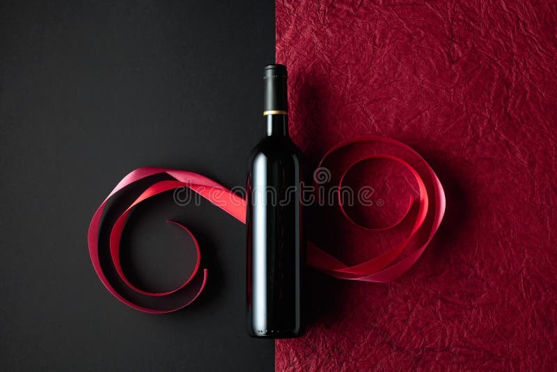 Bottle of Red Wine with Red and Pink Satin Ribbons Stock Image - Image ...