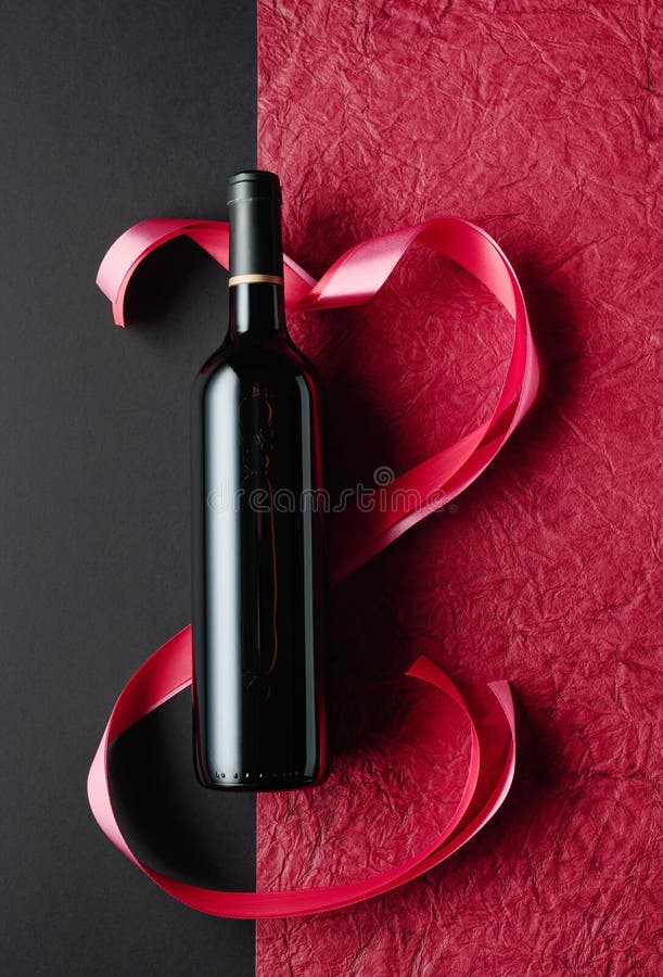 Bottle of Red Wine with Red and Pink Satin Ribbons Stock Image - Image ...