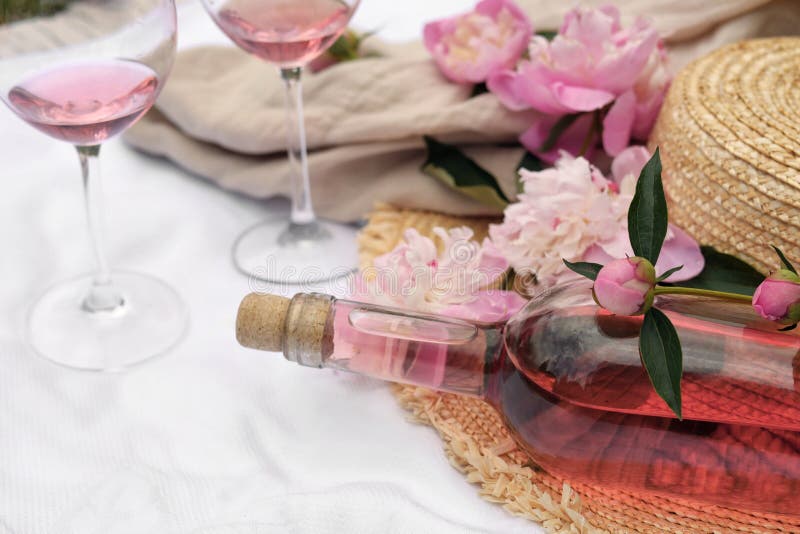 Bottle of Rose Wine and Peonies on White Fabric Stock Image - Image of ...