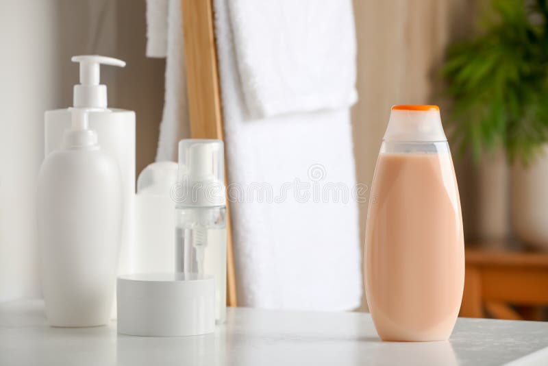 Bottle of Shampoo and Toiletries on White Table in Bathroom Stock Image ...