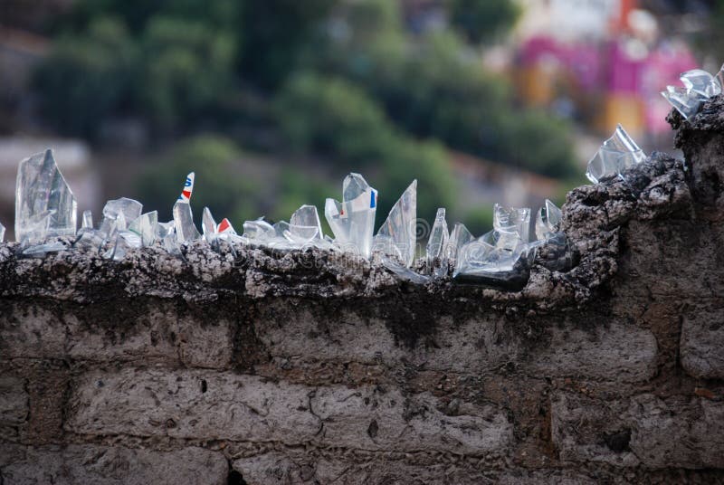 Bottle-shards on a wall stock photo. Image of object, guard - 7185074