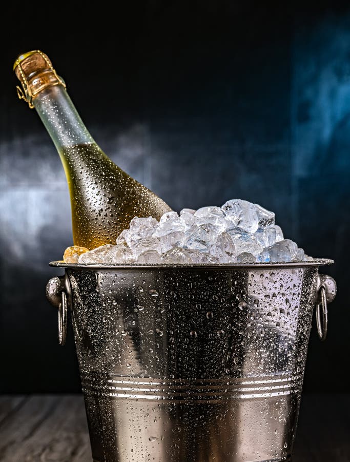 Bottle of Sparkiling Wine in Bucket with Crushed Ice Stock Image ...