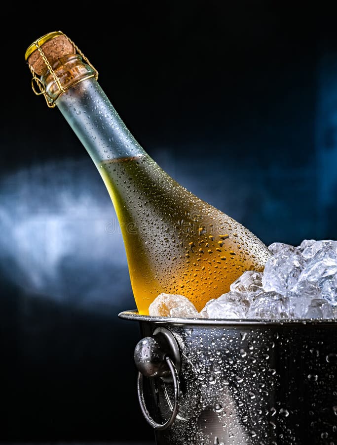 Bottle of Sparkiling Wine in Bucket with Crushed Ice Stock Photo ...