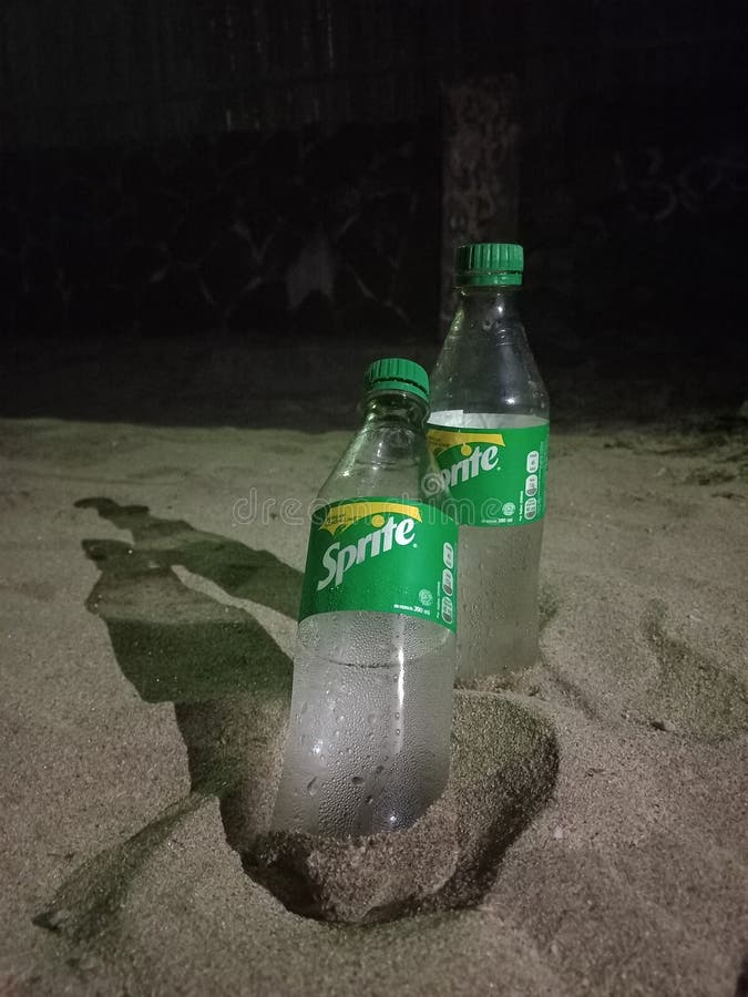 Bottle of Spite on the Beach Editorial Photography - Image of spite ...