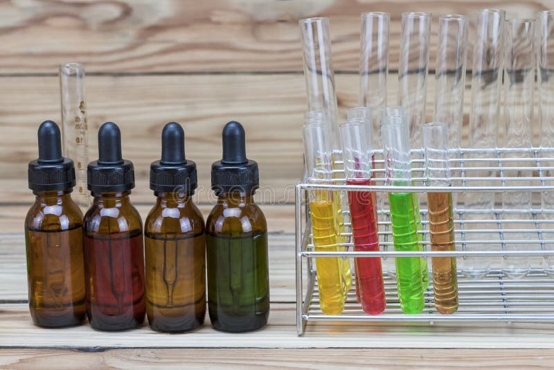 Bottle and Stand with Test Tubes. Several Chemical Solution in Flask ...