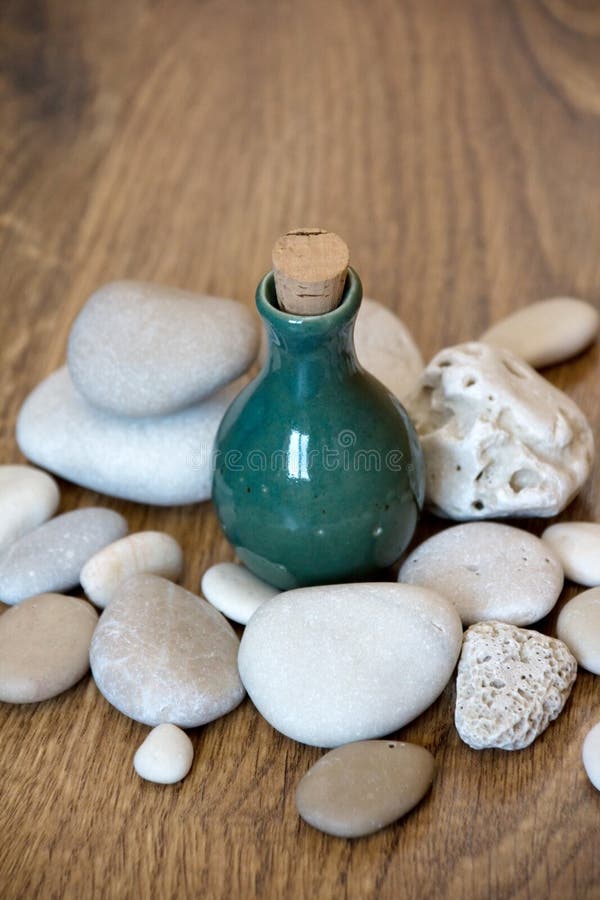 Bottle and Stones stock image. Image of little, decoration - 18896365
