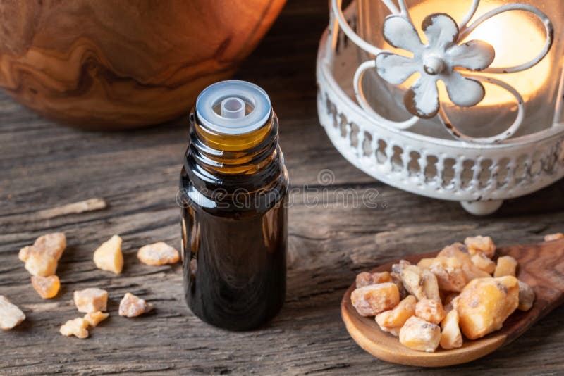 A Bottle of Styrax Benzoin Essential Oil with Benzoin Resin Stock Image ...