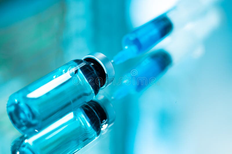 Bottle and Syringe of Serum Drug for Injections in Lab Stock Image ...