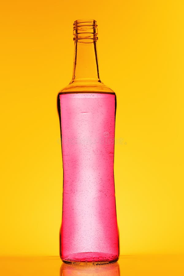 A yellow bottle stock photo. Image of glass, full, green - 128255024