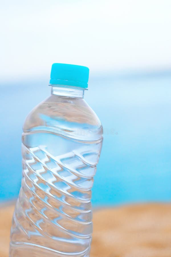 Bottle of Water on the Beach - Drinks, Summertime and Environment ...