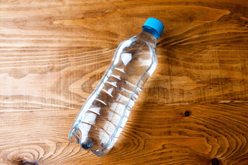 Bottle of Water on a Wooden Table Stock Photo - Image of freshness ...