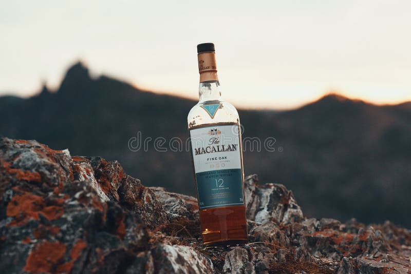 Bottle of Whiskey on Top Overlooking a Landscape Editorial Photography ...