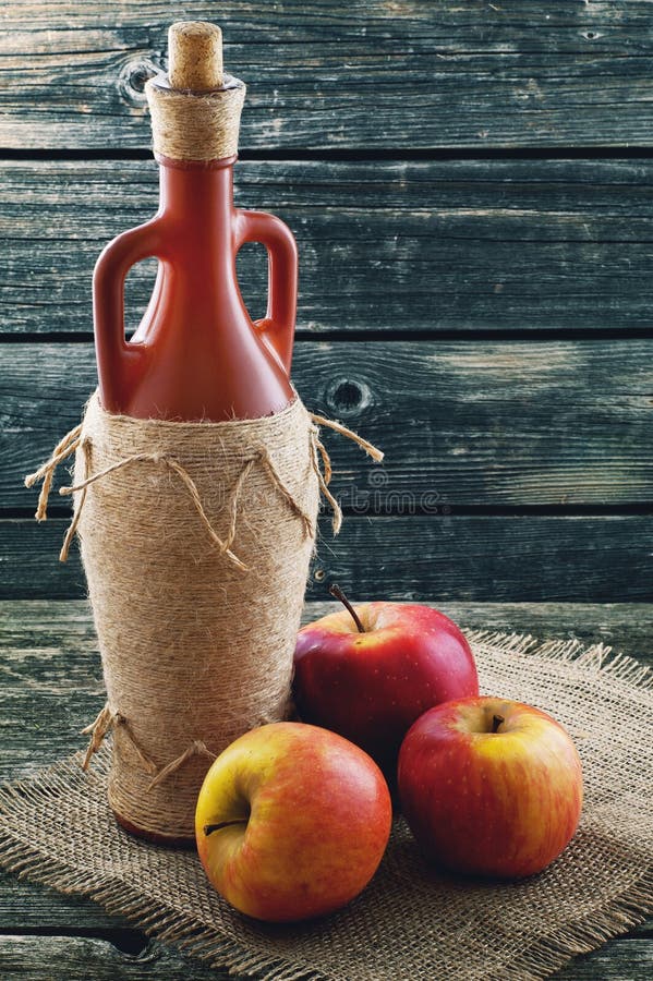 Bottle of Wine and Apples on a Background of Jute Stock Image - Image ...