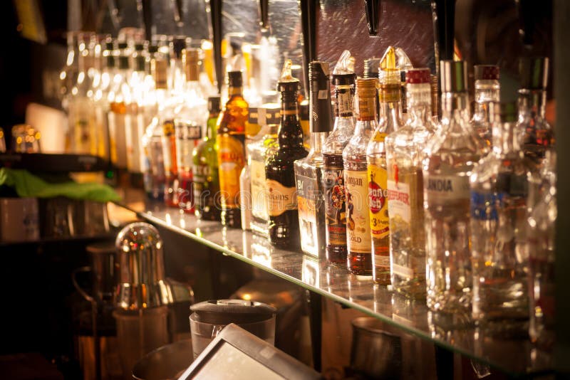 Bottles of alcohol editorial stock photo. Image of beer - 80532798