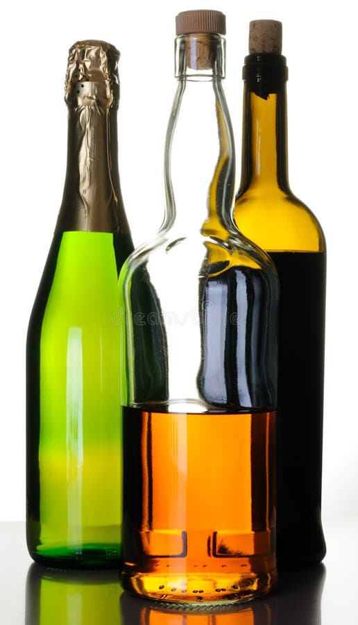 Bottles of alcohol drinks stock image. Image of reflection - 15395251