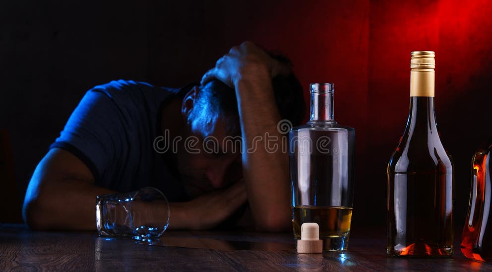 Bottles with Alcoholic Beverages and the Figure of a Drunk Man Stock ...