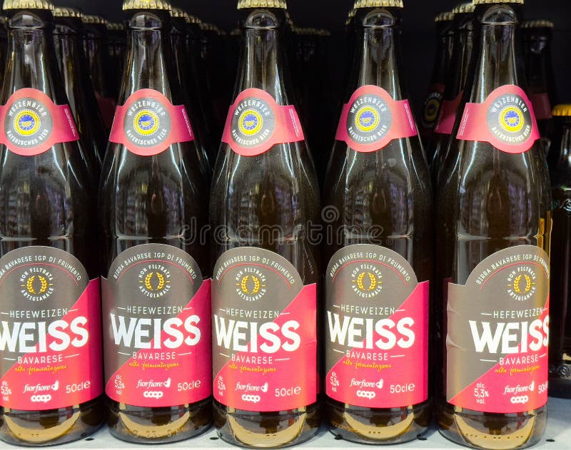 Bottles of Bavarian Weiss Beer with Red Labels on Store Shelf Editorial ...