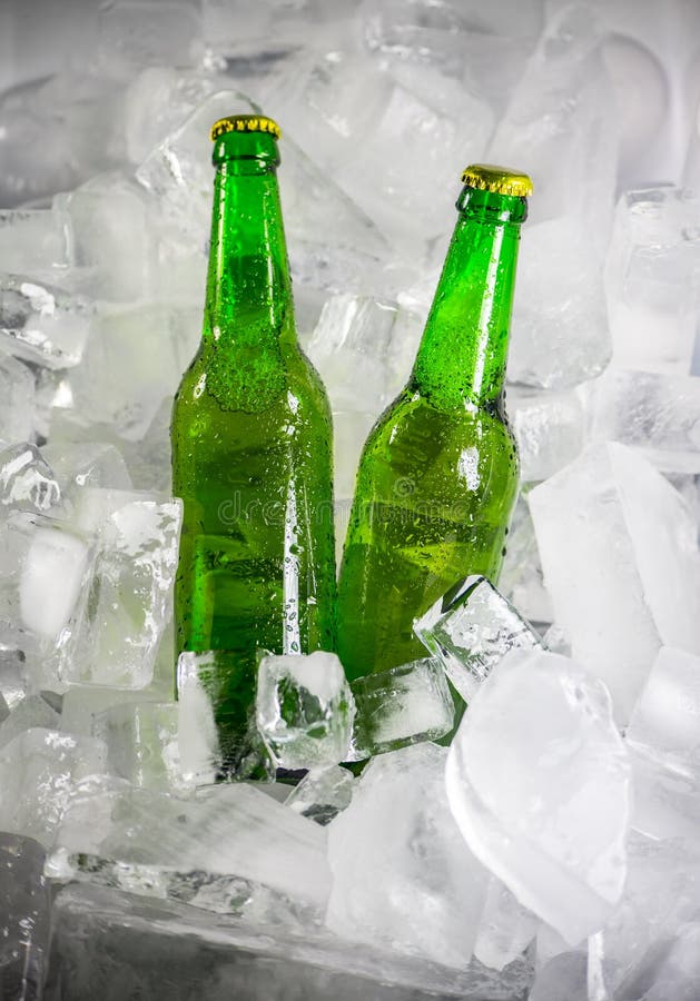 Bottles of beer on ice stock photo. Image of cool, transparent - 90989098