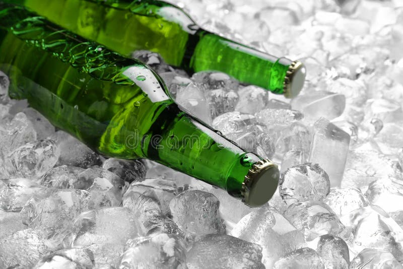 Bottles of Beer on Ice Cubes Stock Image - Image of fresh, freezer ...
