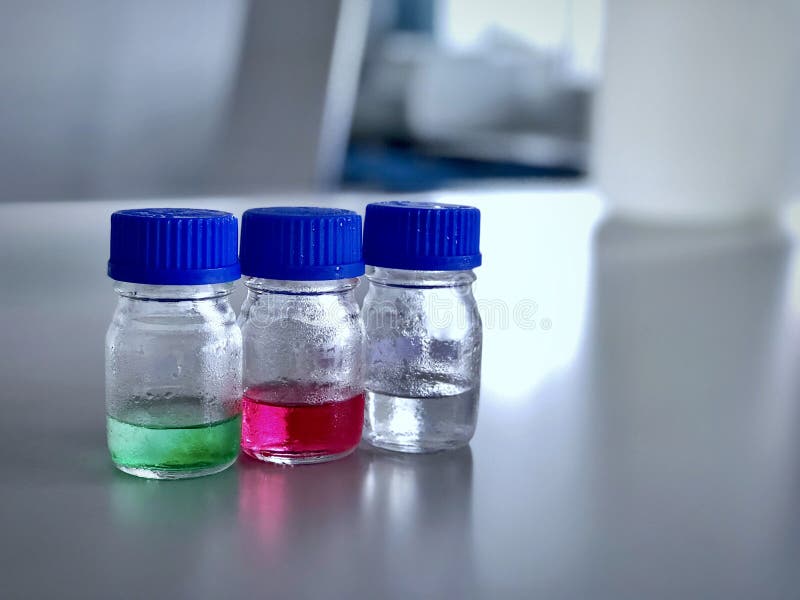 Bottles and Blue Cap with Green, Red and Clear Solution Buffer PH 4, 7 ...