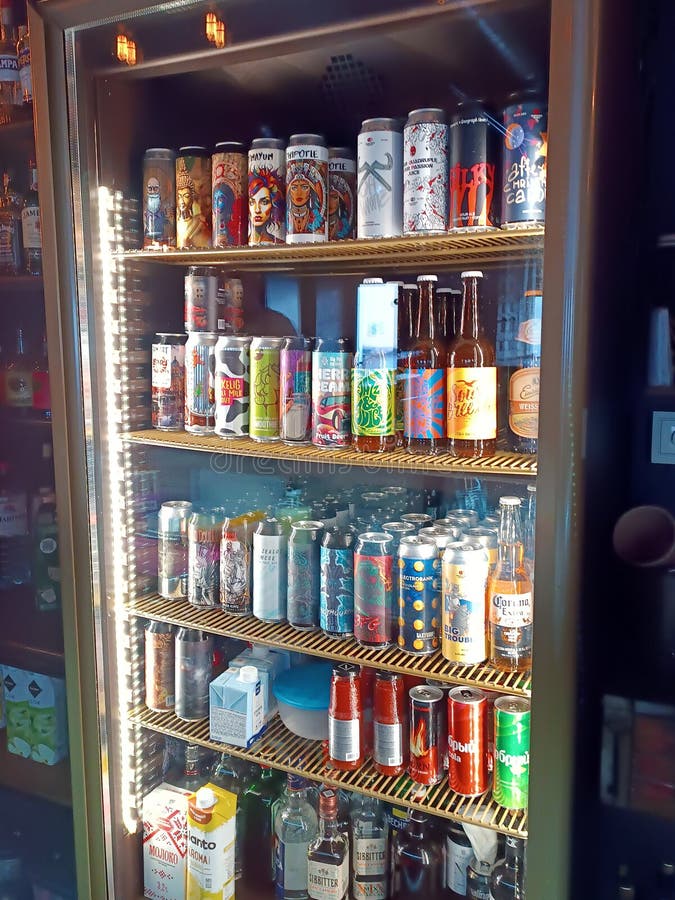 Bottles and Cans of Beer in Fridge of Bar Editorial Photography - Image ...