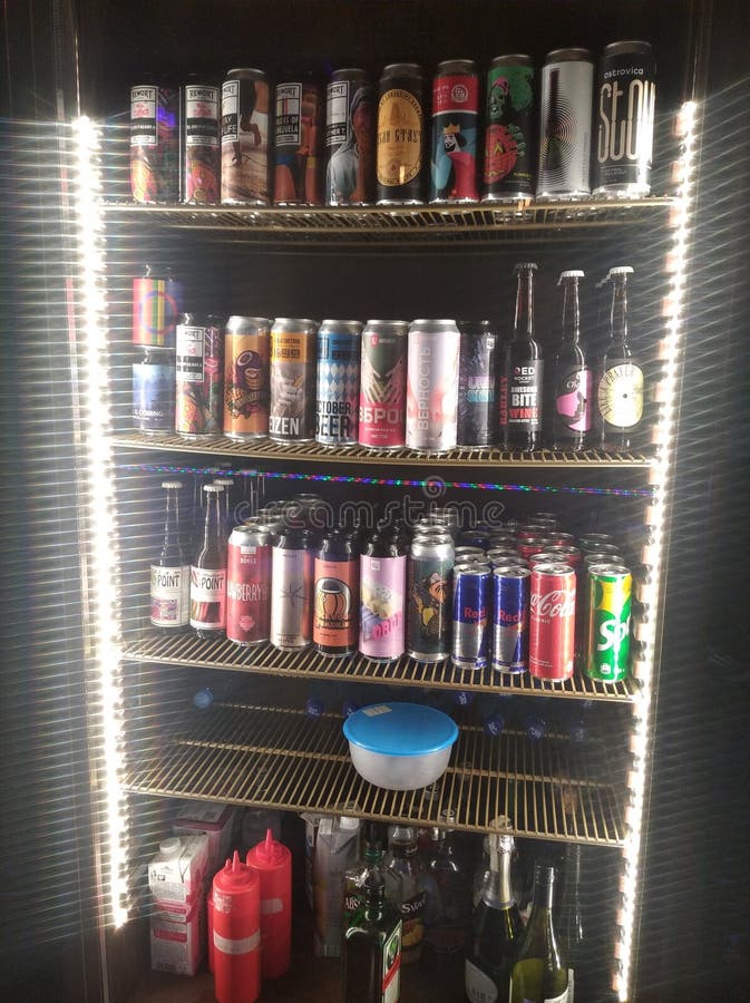 Bottles and Cans of Beer in Fridge of Bar Editorial Image - Image of ...