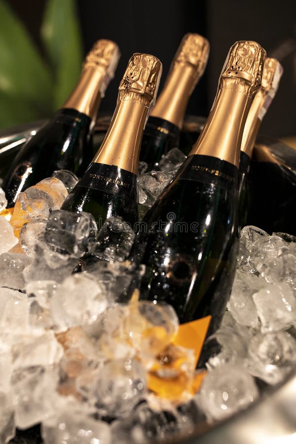 Bottles of Champagne in Cooler. Bottles in Bucket of Ice in the ...