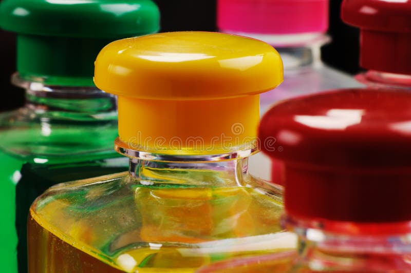 Bottles with Color Liquids. Stock Image - Image of plastic, bath: 26146057