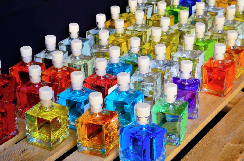 Colored perfume bottles stock image. Image of woman, beauty - 4913003