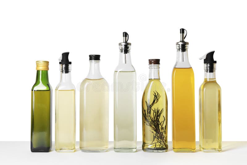 Bottles of Different Cooking Oils on White Background Stock Photo ...