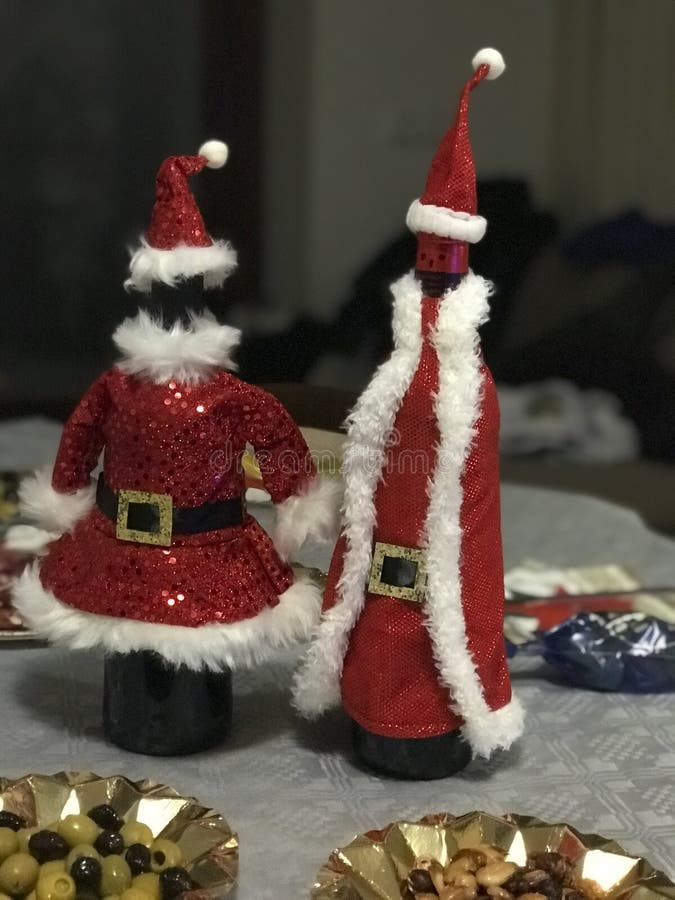 Bottles Disguised with Santa Claus Costume Stock Image - Image of drink ...
