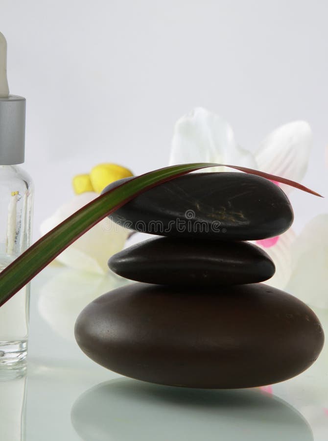 Bottles of Essential Oil and Set Stones Stock Photo - Image of rock ...