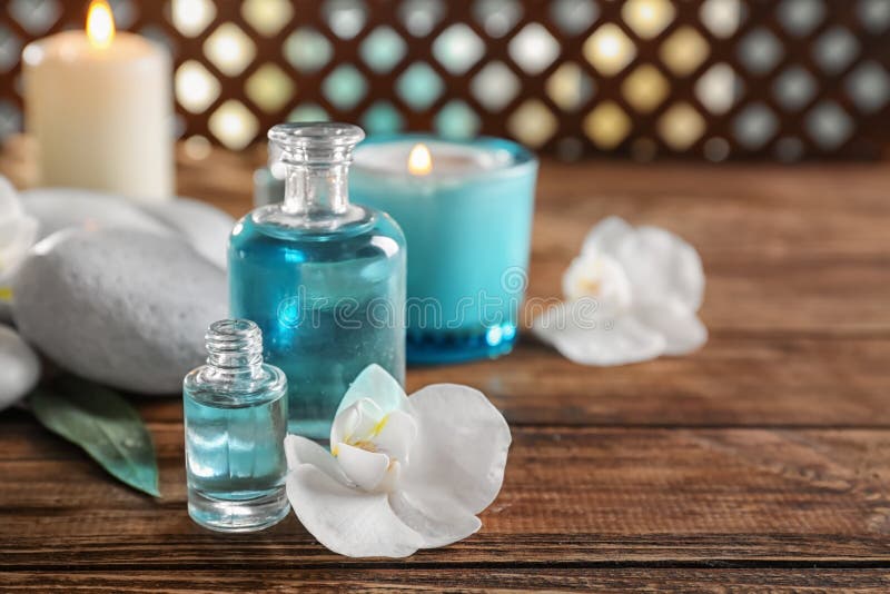 Bottles of Essential Oil for Spa Procedures on Table Stock Image ...