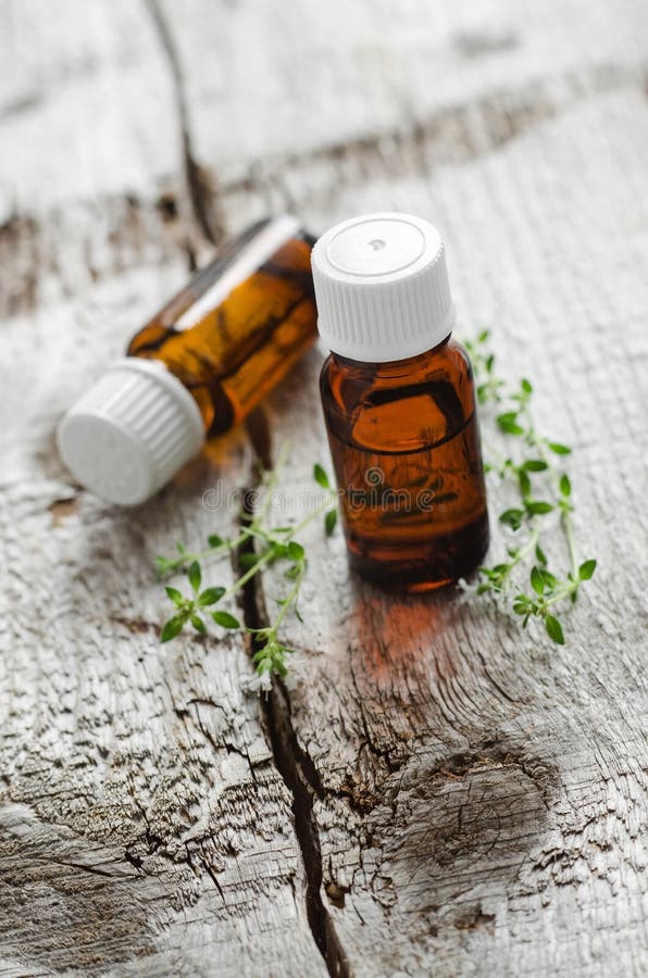 Bottles of Essential Thyme Oil Stock Image - Image of herbal, bottle ...