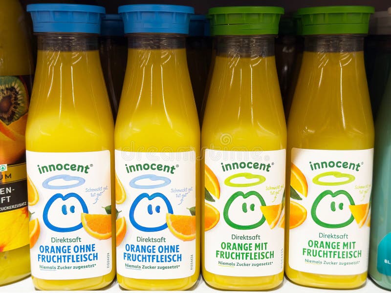Bottles of Innocent Orange Juice with and without Pulp on a Store Shelf ...