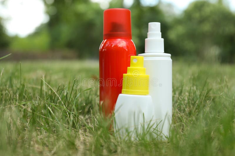 Bottles of Insect Repellent on Green Grass Stock Image - Image of ...