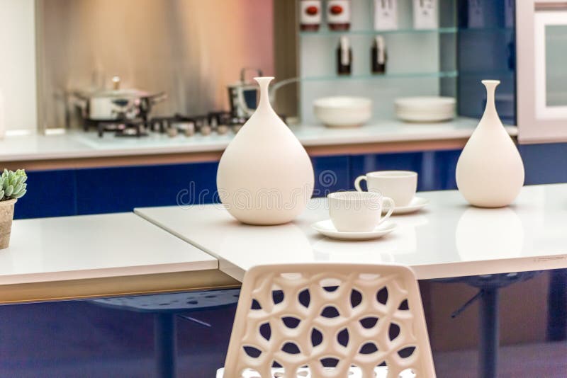 Bottles on kitchen table stock photo. Image of furniture - 126179332