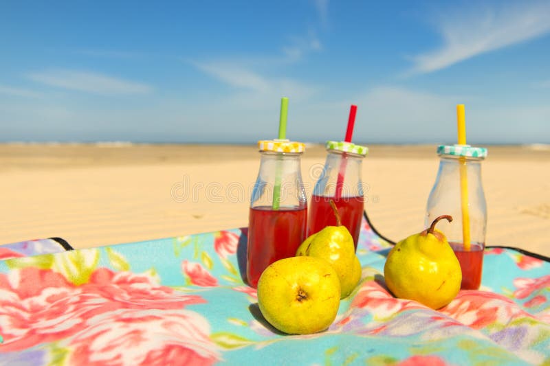 Bottles Lemonade and Fruit at Beach Stock Photo - Image of straw ...