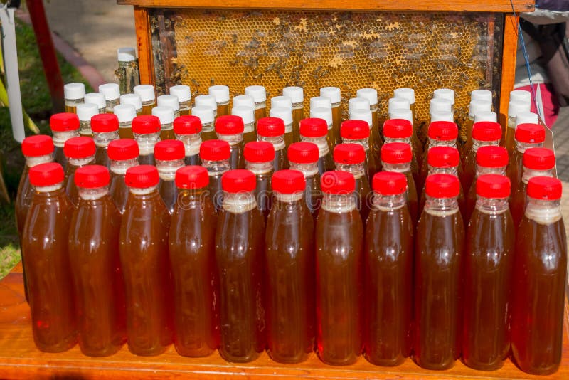 Bottles with Natural Pure Honey Stock Image - Image of plant, natural ...